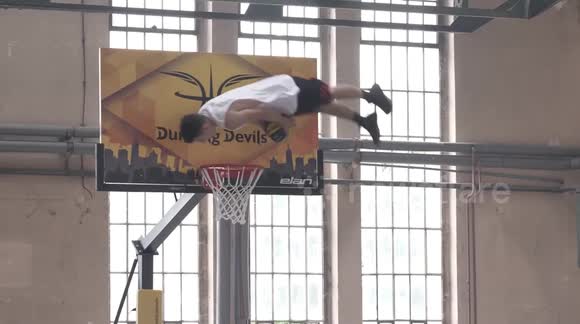 Slovenian stuntmen perform flips and basketball dunks in abandoned ...