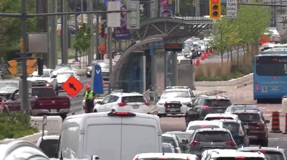 Traffic jams formed in road construction zone on hot sunny summer day ...