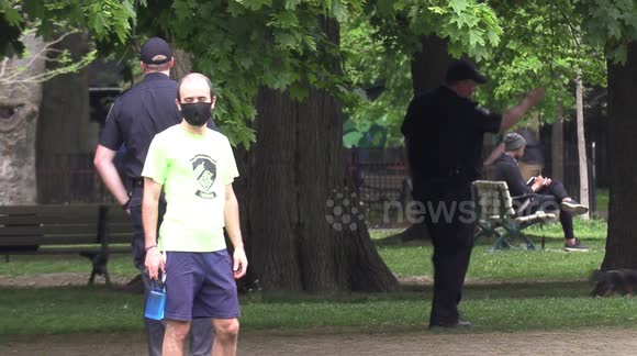 Toronto bylaw officers with ticket books in hand patrol Trinity ...