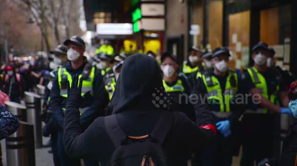 BLM protestor in gloves holds his hands up to police, Melbourne - Buy ...