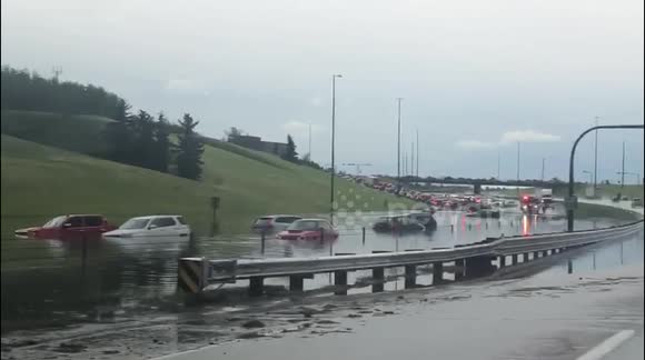 Flash flooding hits Calgary in Canada after tornadoes touch down - Buy ...