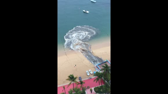 Shocking scene of polluted water discharging over Mexican beach - Buy ...