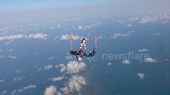 Acrobatic skydiving over Dunk island - Buy, Sell or Upload Video ...