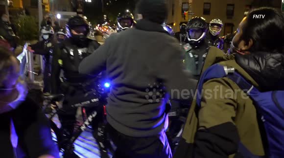 Protester gets hauled to ground by cops in downtown New York as 20 are ...