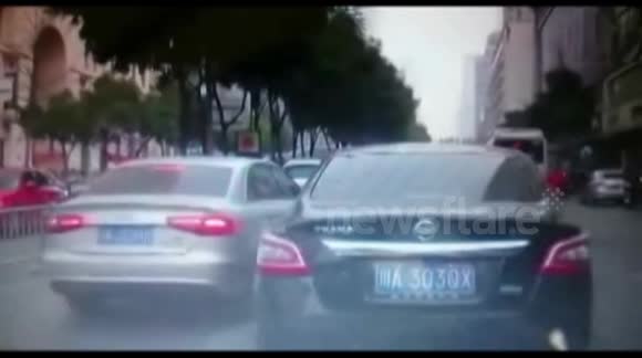 Car drives on top of other car in China road rage incident - Buy, Sell ...