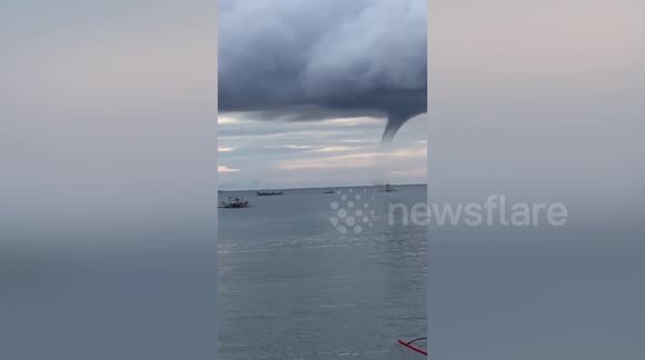 Terrifying waterspout tornado forms off the coast of the Philippines ...