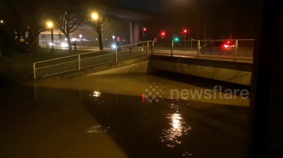 'River Roding' bursts its banks as it floods its pathway through London ...