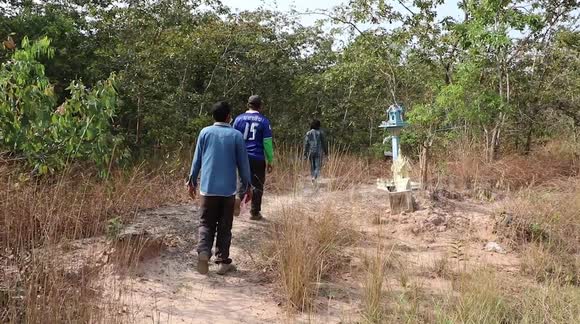 Thai villagers worship bizarre termite nest that looks like ghost of ...