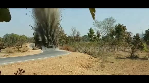 Debris hurled 40 feet into the air as Indian police detonate two bombs ...