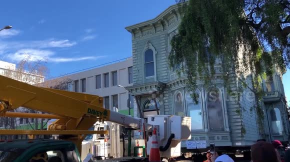 Watch this old two-storey house get lifted from its foundations and ...