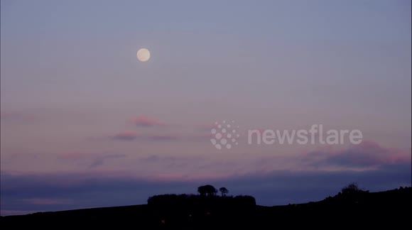 Full snow moon rising over ancient Minninglow Tree Henge & Neolithic ...