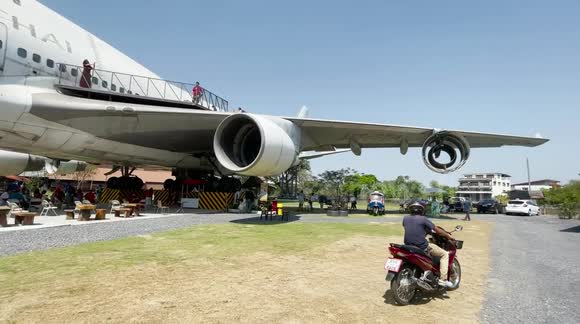 Visitors enjoy Boeing 747 plane converted into cafe in Thailand - Buy ...