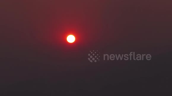 The setting sun is blurred by severe air pollution in northThailand ...