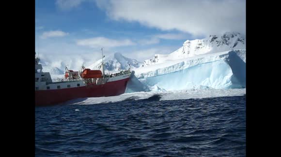 Antarctic iceberg crashes into sea after powerful collision with ship ...