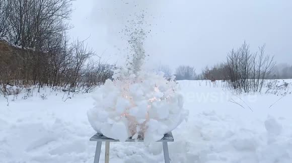 This is what happens when you set off a firework inside a chunk of ice ...