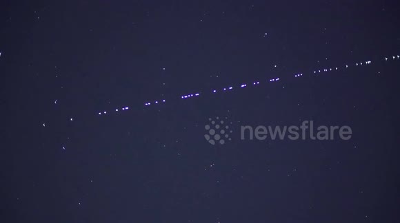 Train of Starlink satellites lights up sky as they pass over ...