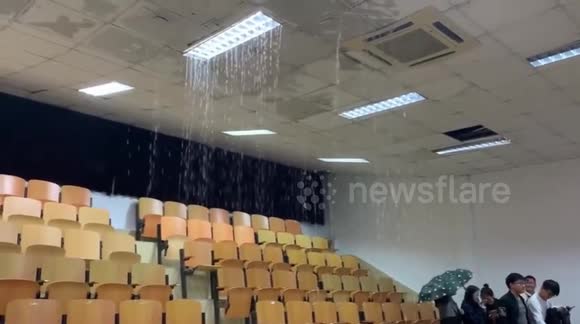 Students cower as university classroom roof collapses under weight of ...