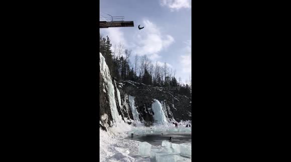 Canadian woman completes incredible first ever high dive into frozen ...