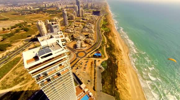 Paraglider soars over skyscrapers in Israel - Buy, Sell or Upload Video ...