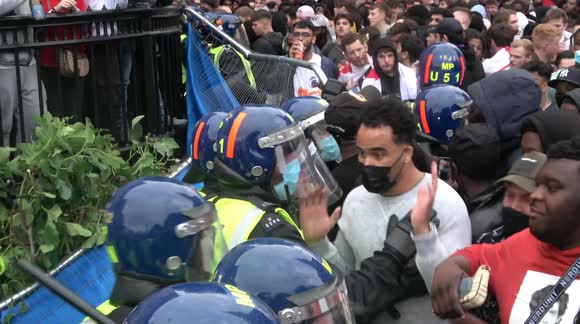 Riot police come under heavy missile fire whilst preventing unticketed ...