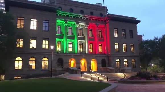 The McDougall Center in Calgary, Canada illuminated with the colors of ...