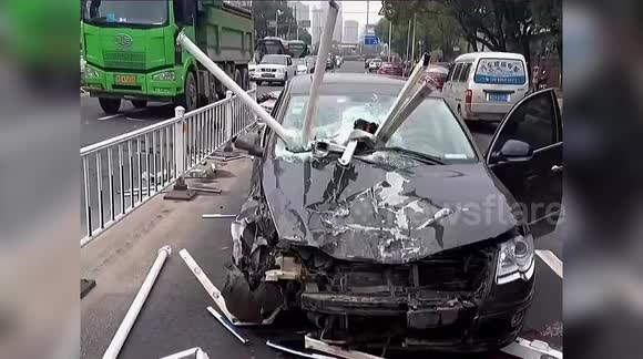 Steel bars impale car after tired motorist drives vehicle through ...