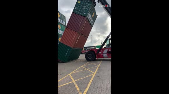 'Heavy shipping containers almost crush the loading machine after it ...