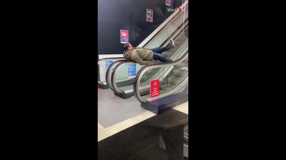 UK dad gets in on the 'Escalator Spin' craze with comical results - Buy ...