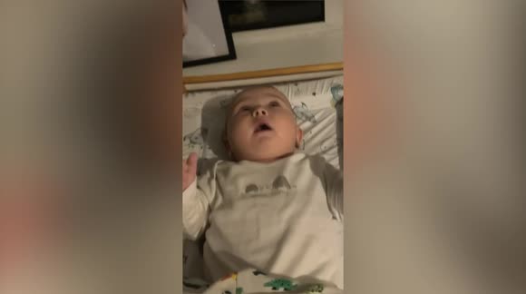 Watch the hilarious moment this baby babbles his way into saying ...