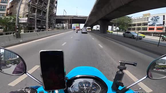 Motorcycle rider crashes into cyclist as he is knocked over to ground ...