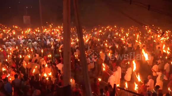 Thousands of devotees turn night into day with torches at south Indian ...