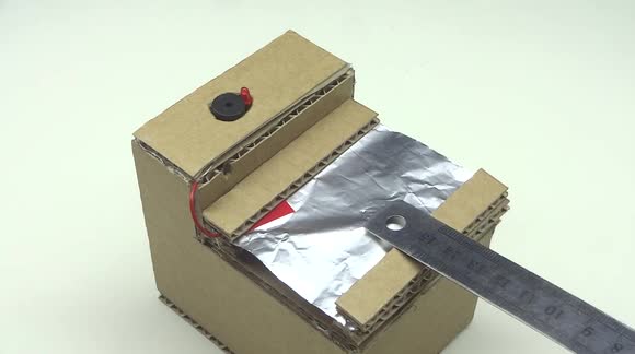 DIY expert uses cardboard and foil to build miniature metal detector ...