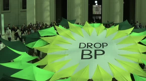 Extinction Rebellion activists open giant 'Drop BP' banner in British ...