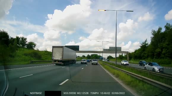 DashCam footage of car with family inside veering from Lane 1 into lane ...