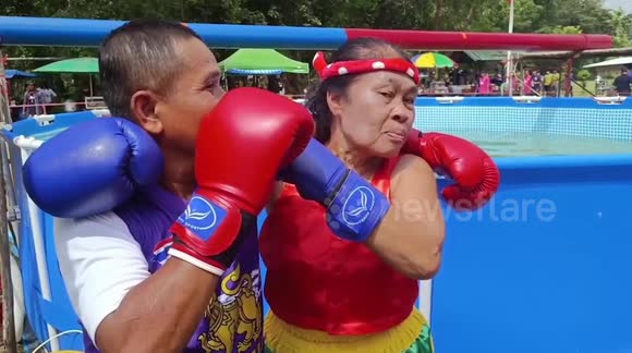 Locals hold hilarious 'water boxing' contest during community sports ...