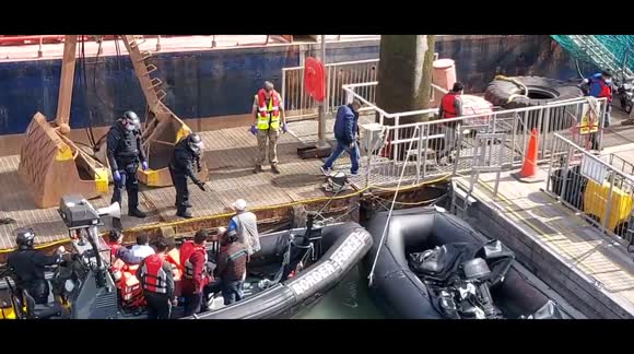 Migrants being unloaded from a Border Force RHIB at Dover port. - Buy ...