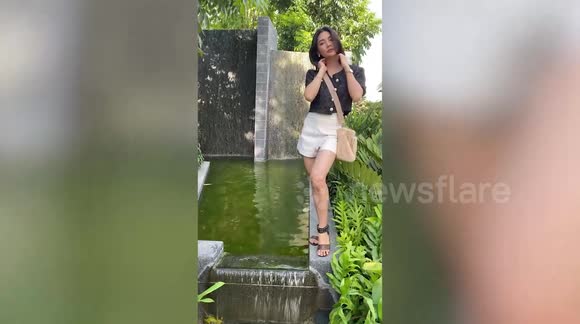 Funny photoshoot fail as preening influencer slips and falls into pool ...