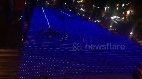 Spiders crawl down stairs in cool light show at Kyoto station - Buy ...