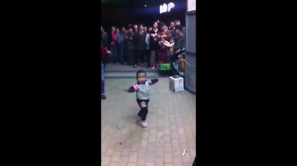 Dancing toddler leads whole troupe of dancers in Chinese square - Buy ...