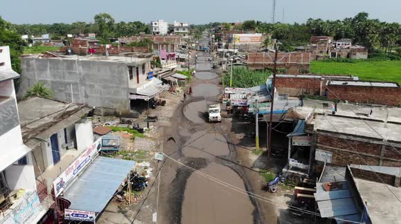 So you thought your local roads were bad? Drone footage reveals GIANT ...