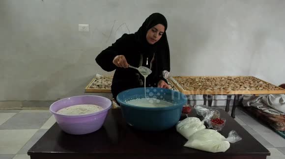 Palestinian Ghalia Abu Saadeh, 30, makes Keshek or Kishk at her home ...