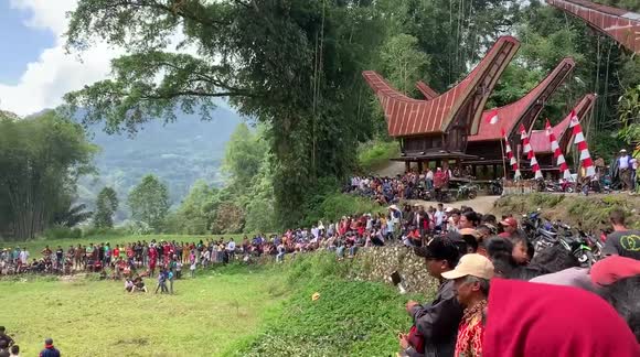Indonesian men gather for traditional Sisemba mass kick fighting during ...