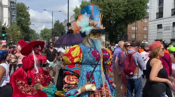 People wear flamboyant costumes at Notting Hill Carnival - Buy, Sell or ...