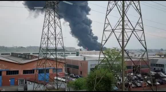 Person seriously injured as thousands of litres of solvents burn in ...