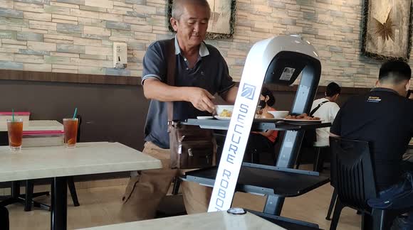 Malaysian restaurant employee robot waiters to deliver food to diners - Buy, Sell or Upload ...