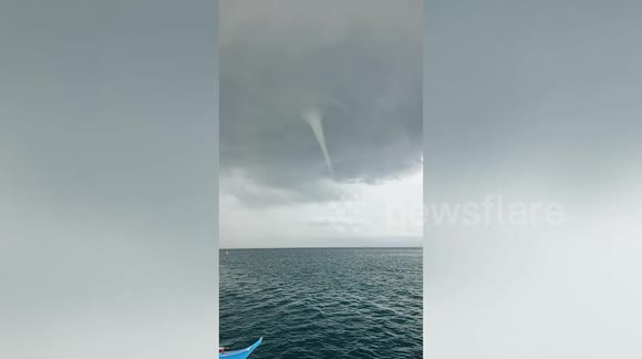 Fishermen sails past funnel cloud that turned into waterspout - Buy ...