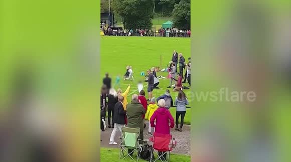 Adorable video shows a six-year-old girl who ran past the finish line ...