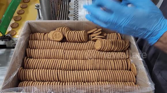 Palestinian workers prepare the vanilla candy known as "Ras El-abed or ...