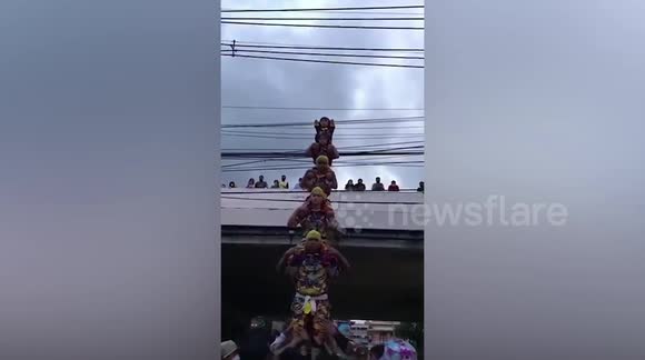 Brave performers form tall human tower for villager's birthday in ...