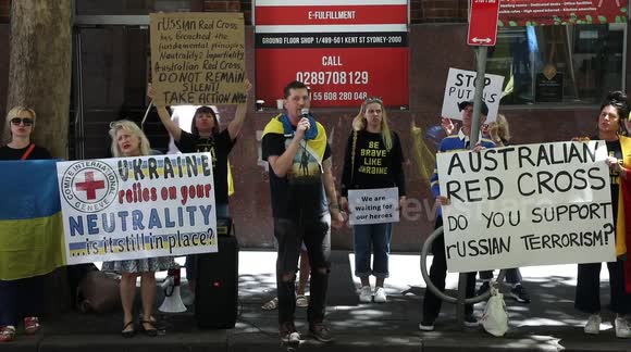 Ukrainians and their supporters protest against the Red Cross in Sydney ...